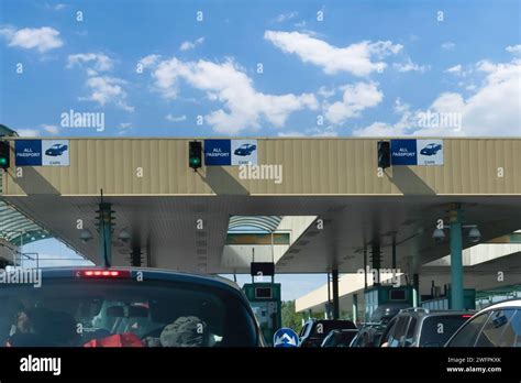 Customs Checkpoint For Cars Passport Verification And Document Inspection At Border Crossing Customs Checkpoint For Cars Passport Verification And Document Inspection At Border Crossing