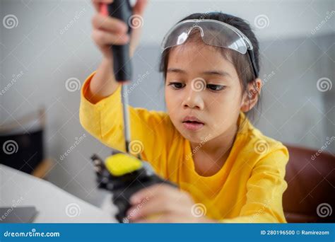 Stem Education Concept Asian Students Learn At Home By Coding Robot