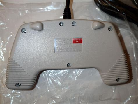 Crispy Pictures Of An Unused 80s Nintendo Nes Max Controller And The Original Japanese Version