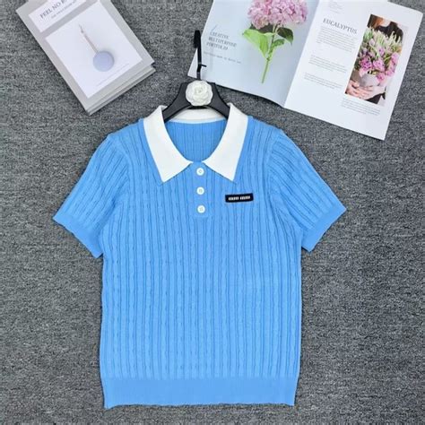 Поло Женский Miu Miu синий Короткий размер 42 Хлопок Логотип облегающий Повседневный Китай