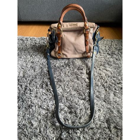 Miu Miu 10” ทำสีบางจุด มีรอยใช้งานบ้างแต่ยังสวยไม่เยิน Shopee Thailand