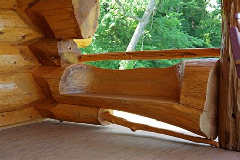 Clever Carving On Structural Log Makes For Porch Seat Pioneer Log Homes Of British Columbia Clever Carving On Structural Log Makes For Porch Seat Pioneer Log Homes Of British Columbia