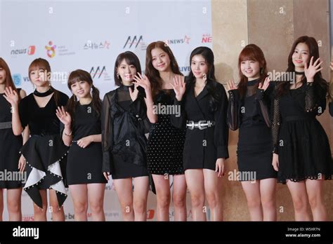 Members Of South Korean Girl Group Izone Stylized As Izone Pose As