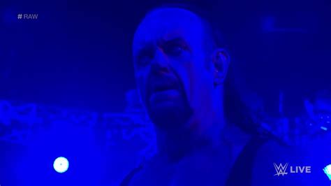 Video Undertaker Returns On Wwe Raw Saves Roman Reigns