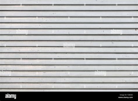 White Vintage Wooden Boards In Overlap Cladding Pattern Front View As