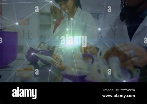 Scientists Working In Laboratory With Network Of Connections And Data