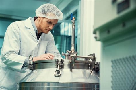 Premium Photo Portrait Of A Scientist Apothecary Extracting Cannabis Oil In Laboratory