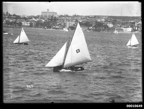 Skiff And Dingy Sailing Near Manly On Sydney Harbour Works