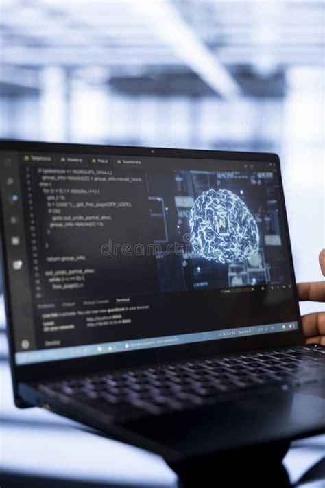 Computer Scientist Using Laptop In Data Center Updating Ai Stock Photo