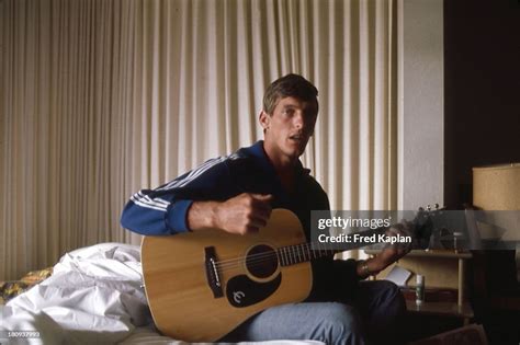 Portrait Of Oakland Raiders Ray Guy Casual Playing Guitar In Hotel