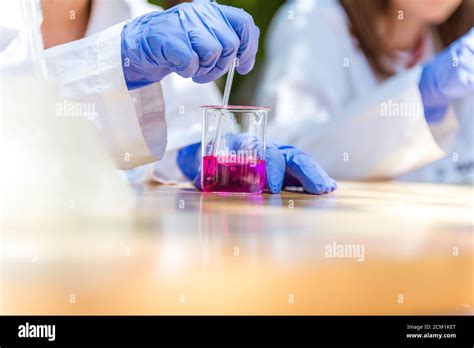 Close Up Of Scientist Holding Flask With Chemical Stock Photo Alamy