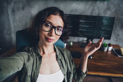 Young Professional Woman Programmer With Glasses Working In A Modern Workspace Coding On A