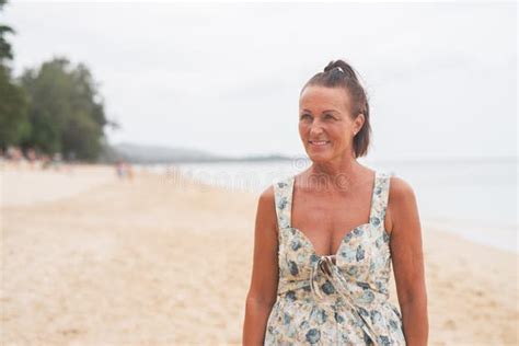 Beautiful Mature Woman In Thailand Beach During Summer Stock Image