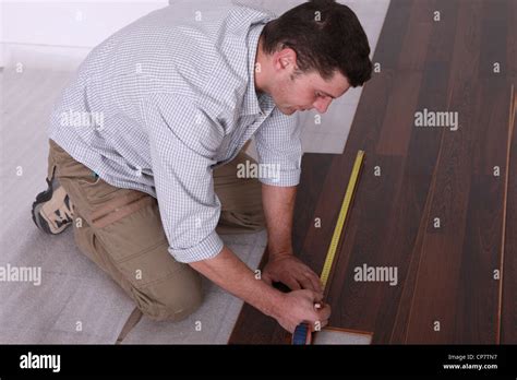 Man Using A Measuring Tape Stock Photo Alamy