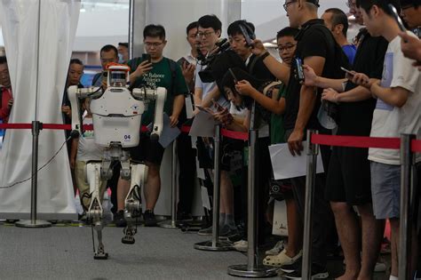 At A Robotics Fair In Beijing Lifelike Robots Android Dogs And