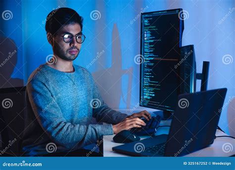 Indian Software Development Working On Coding Computer Screen And Flowchart At Night In Modern
