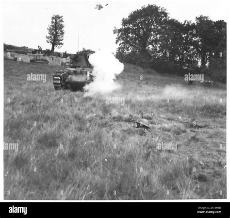 tank demonstration in northern ireland men in slit trenches fire on