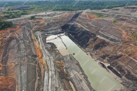 Premium Photo Aerial View Industrial Of Opencast Coal Mining With Lots Of Machinery At Work