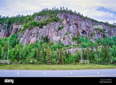 Dramatic Rock Cliff Of Diabase Sills And Red Sibley Rocks Are Seen