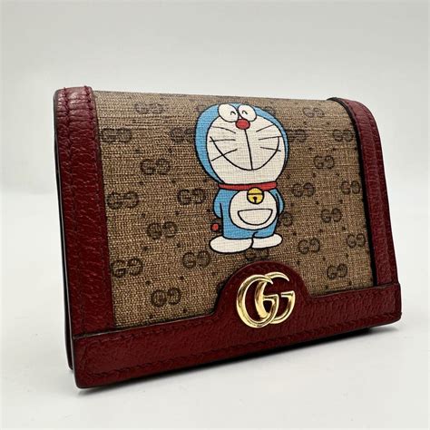 未使用に近い Gucci 折り財布 ドラえもんコラボ マーモント 激レア 【税込】 51 0