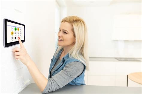 Premium Photo Smart Home Digital Thermostat Touch Screen Woman Touching Touchscreen To Adjust