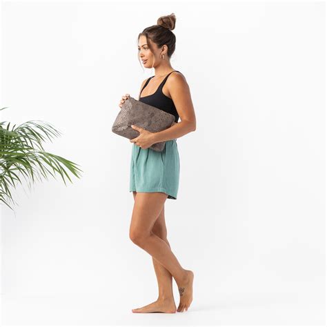 python mid pouch in espresso on black aloha collection
