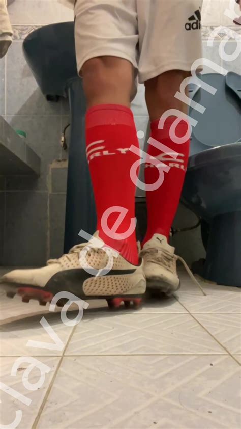Soccer Player Takes His Boots And Socks Off