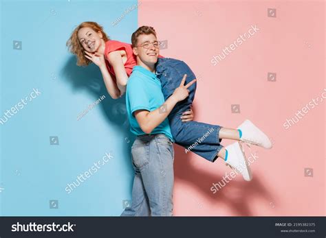 Guy Carrying Girl Over Shoulder
