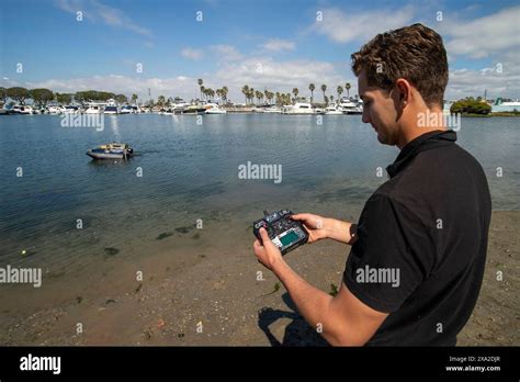 A Robot Floating Trash Collector Sails In Huntington Beach CA