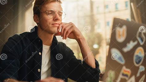 Focused Male Software Engineer Codding On Laptop Computer And Working