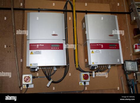 Two Wall Mounted Fronius Ig Inverters Converting Dc Electricity From Pv
