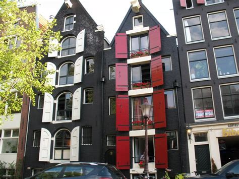 Lillebror Och Storebror Amsterdam Nederland Agde Reiseguiden