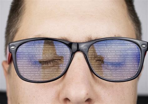 The Programmer`s Glasses Reflect Lines Of Code Programming
