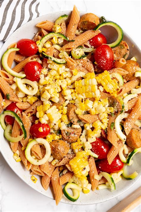 Inspiralized Zucchini And Grilled Corn Pasta With Chicken Sausage And Garlic Basil Dressing