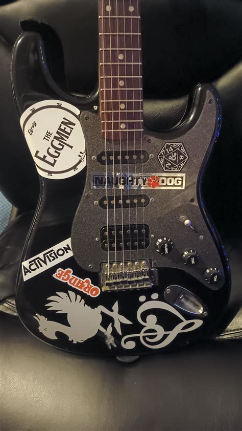 Me Getting Ready To Play Guitar By Getting My Nirvana Themed Pick With