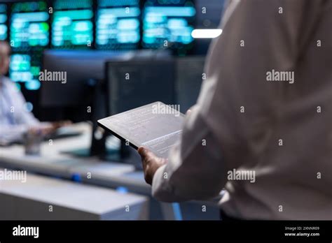 Admin Doing Yearly Checkup To Prolong Data Center Electronics Life Span And Avoid Downtime