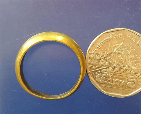 แหวนปลอกมีด เนื้อทองเหลือง มียันต์ เก่า ไม่ทราบคณาจารย์ Ennxo