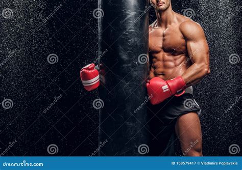 Powerful Male Is Posing With Punching Bag Stock Image Image Of