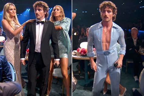 Benson Boone Does Striptease With Assist From Heidi Klum And Nikki Glaser And Nsfw Stage Move