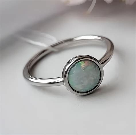 Каблучка зі срібла з білим опалом р 16 кк2опб 1184 • Краща ціна в Києві Україні • Купити в