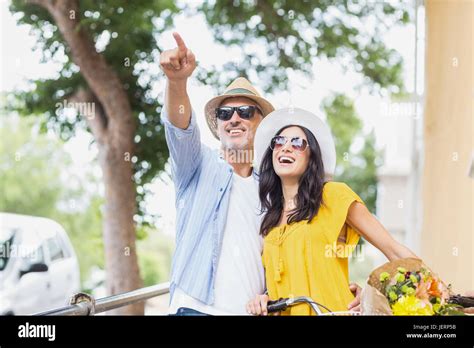 Man Pointing With Woman Stock Photo Alamy