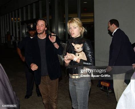 Keanu Reeves And Amanda De Cadenet Are Seen At Lax On February 28