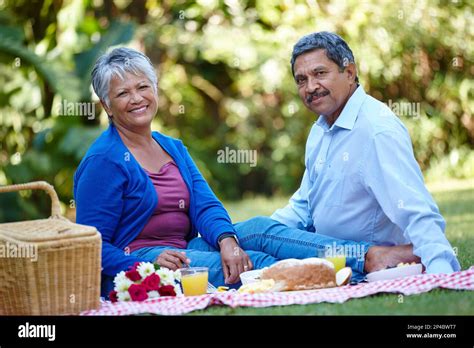 We Still Make Time To Enjoy Each Others Company A Loving Senior Couple Enjoying A Picnic