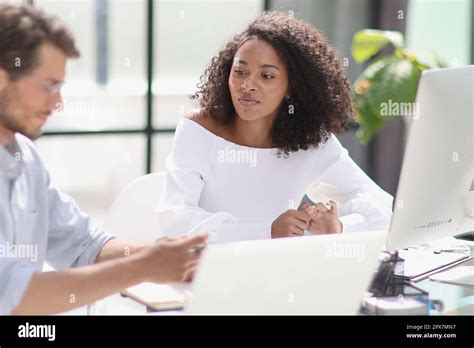 Software Developers Team Discussing Algorithms On Computer Screen Stock