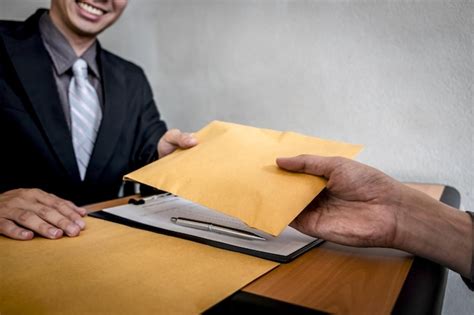 Premium Photo Midsection Of Man Holding Table