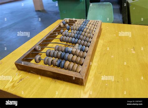 Exploring The Timeless Elegance Of A Classic Accounting Abacus Resting