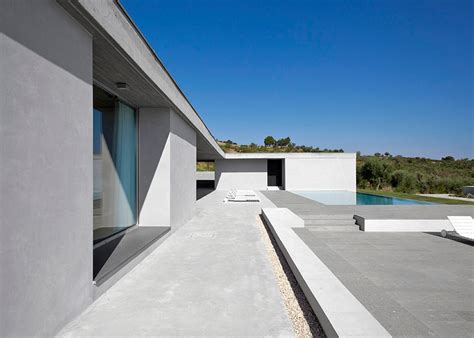 Concrete Home By Osm Is Sunken Into A Hill By An Italian Lake