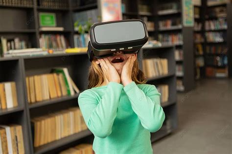 Schoolgirl Using Virtual Reality Headset In Library Photo Background And Picture For Free