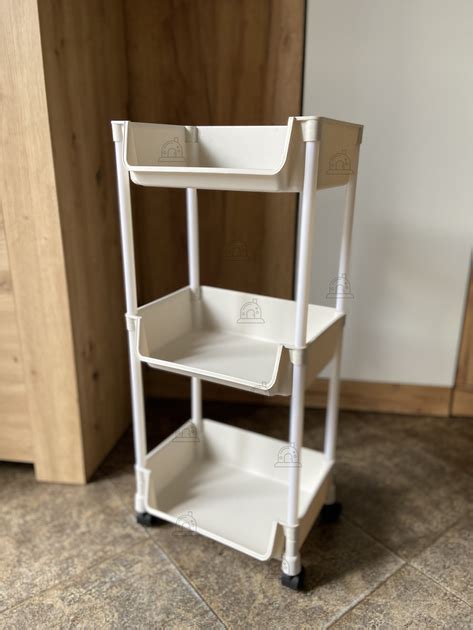 Глибока етажерка для зберігання 3 полиці на колесах пластикова з гачками фото відгуки