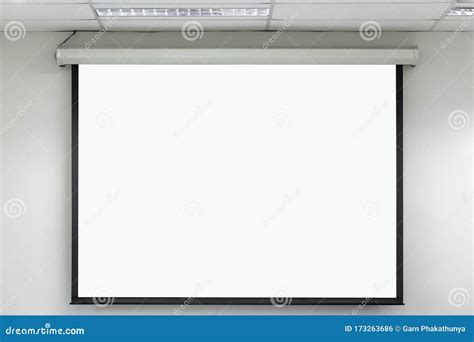 Front View Of Lecture Room With Empty White Projector Screen Stock